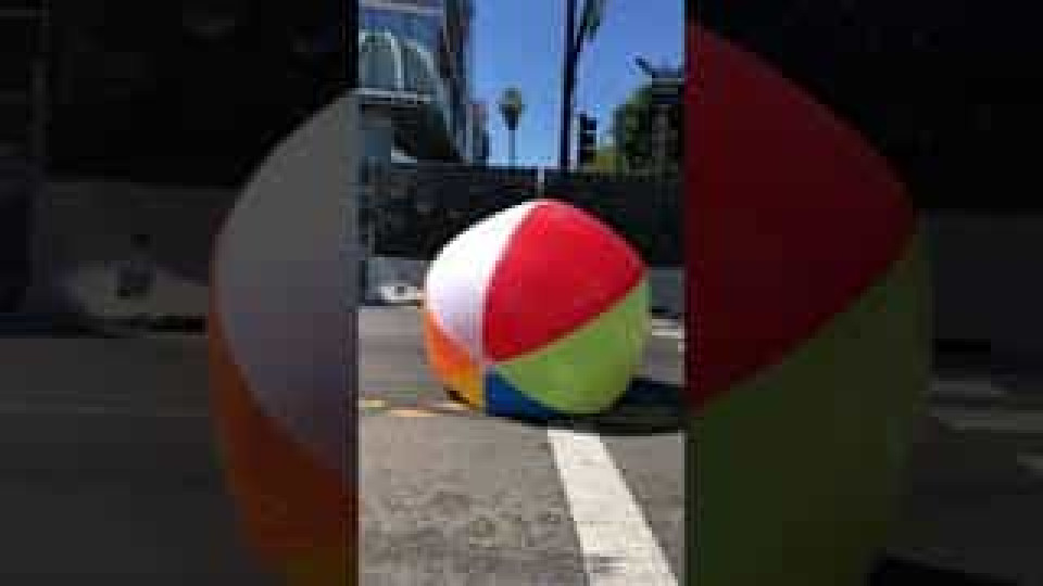 Giant Beach Ball Rolling By - Buzz Videos