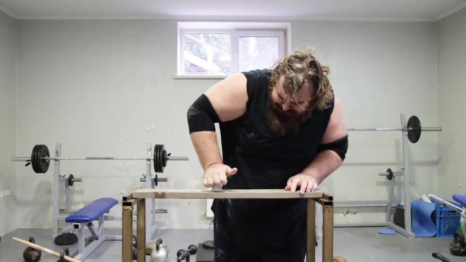 Karate Chopping A Board With Nails - Buzz Videos